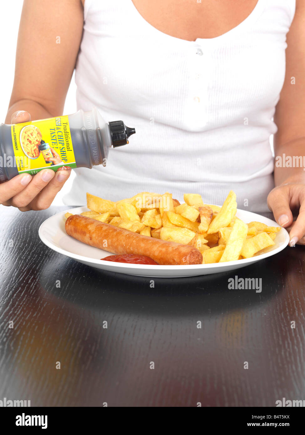 Model released woman eating sausage hi-res stock photography and images ...