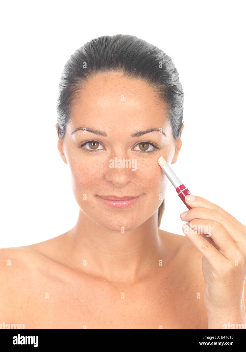 Young Woman Applying Concealer Model Released Stock Photo - Alamy
