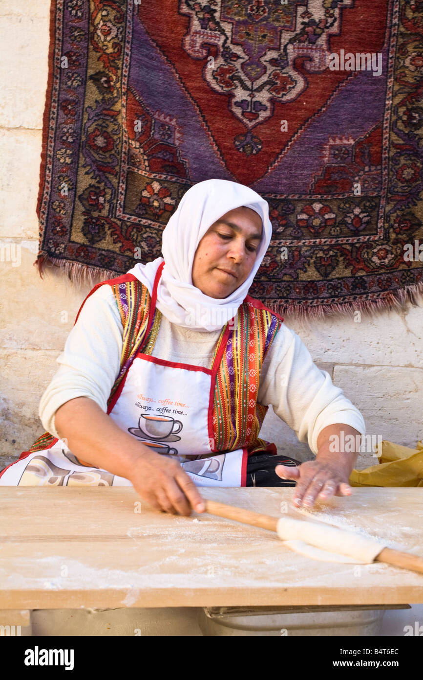 Turkey, Eastern Turkey, Gaziantep, Antep, Bazaar, lady making bread ...