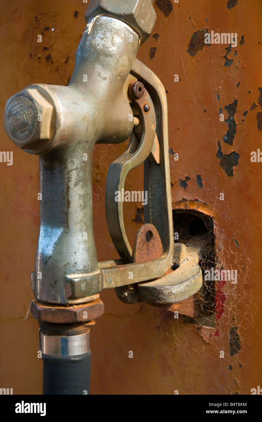 Old rusting fuel pump with spiderwebs growing on the nozzle Stock Photo ...