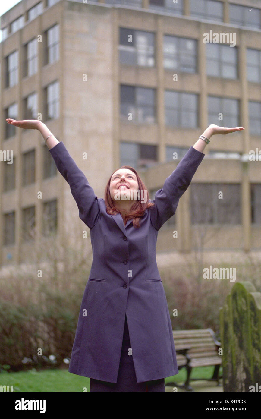 A young woman looking happy excited thrilled Stock Photo - Alamy