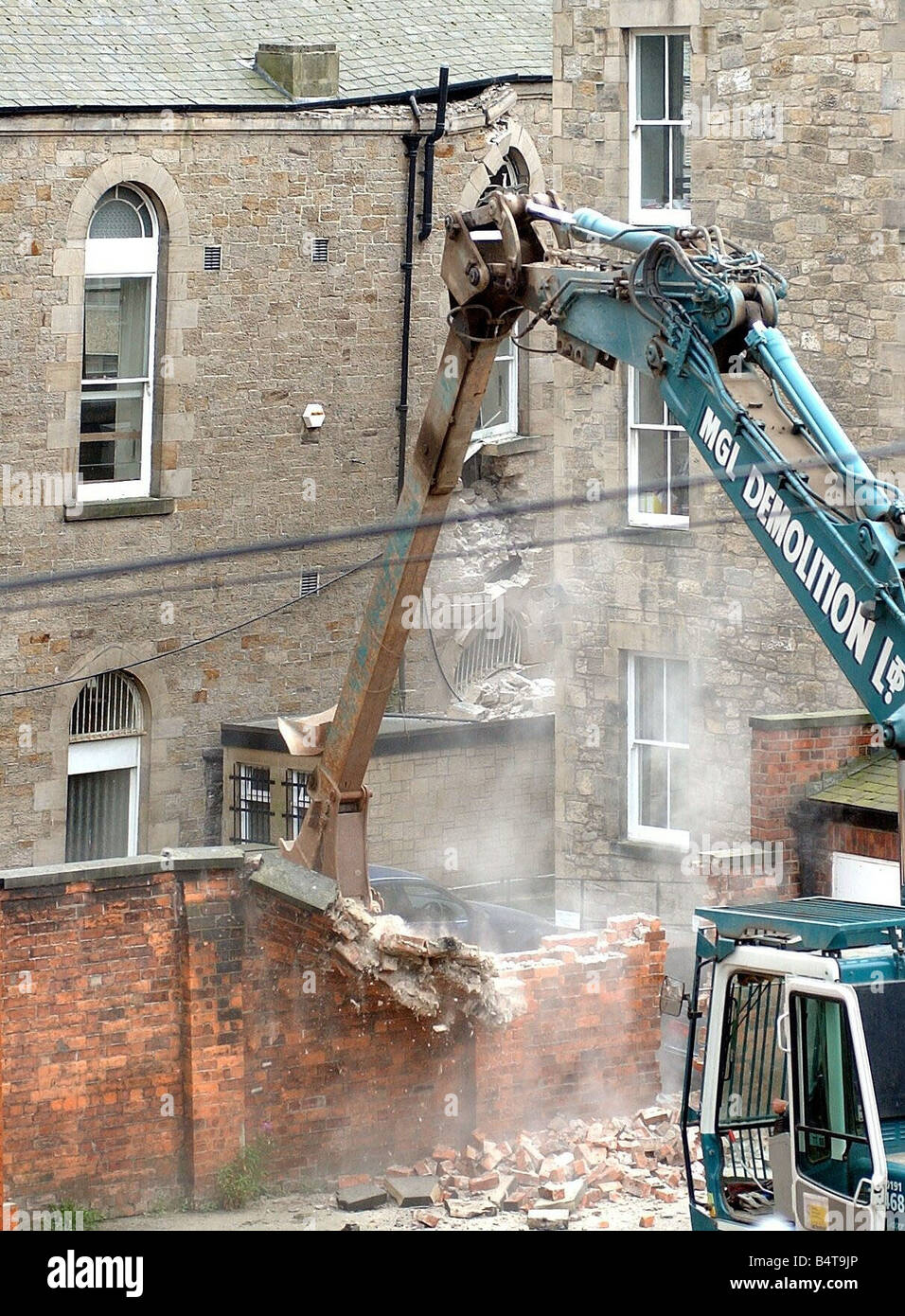 The demolition of a Newcastle building on Grainger Street Stock Photo ...