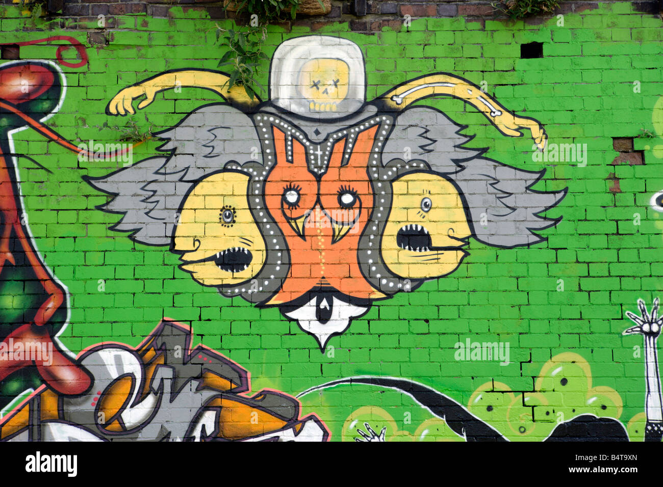 graffiti on the wall below a railway line art wallart community project ...