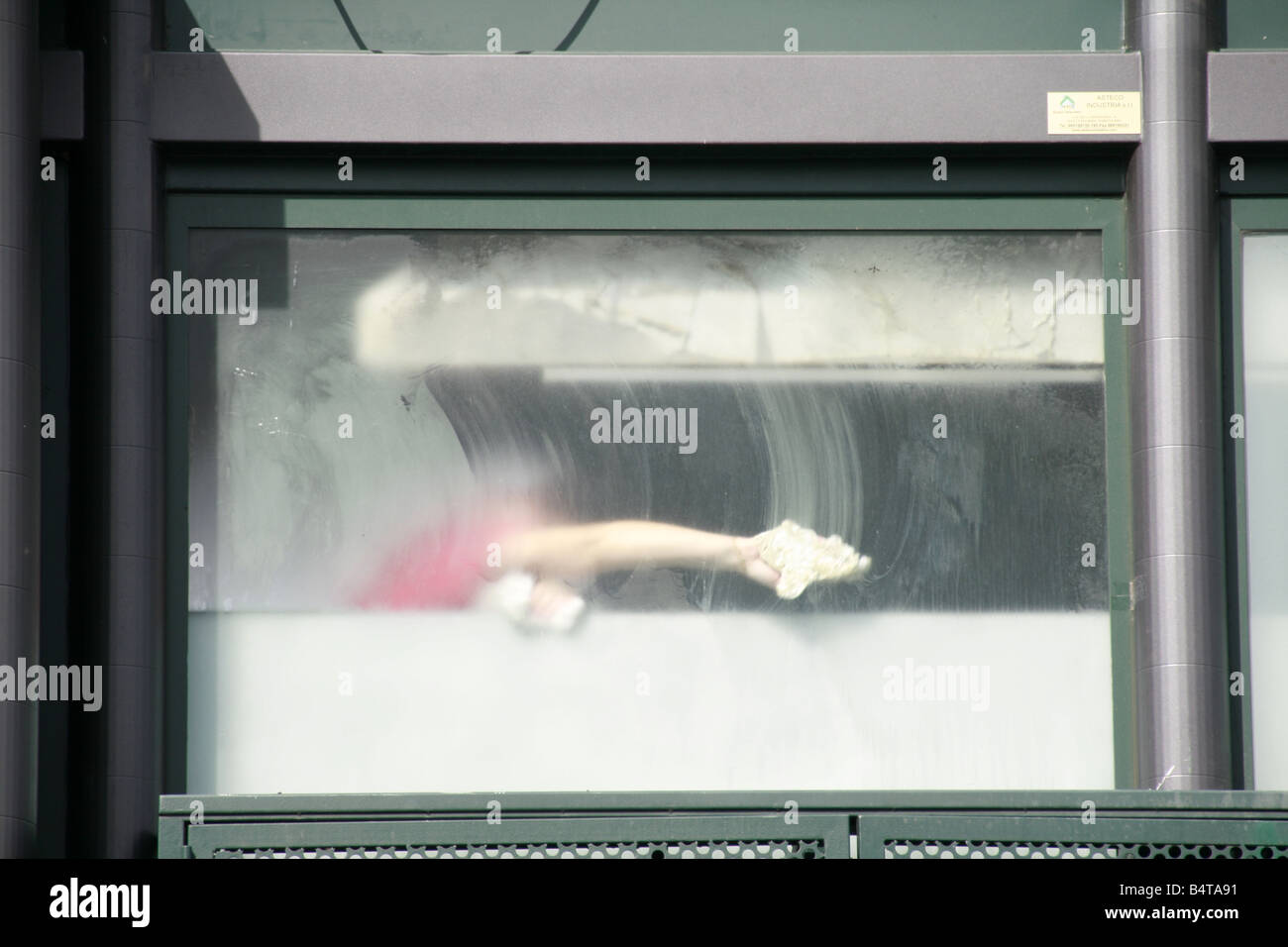 detail of person cleaning dirty shop window Stock Photo - Alamy