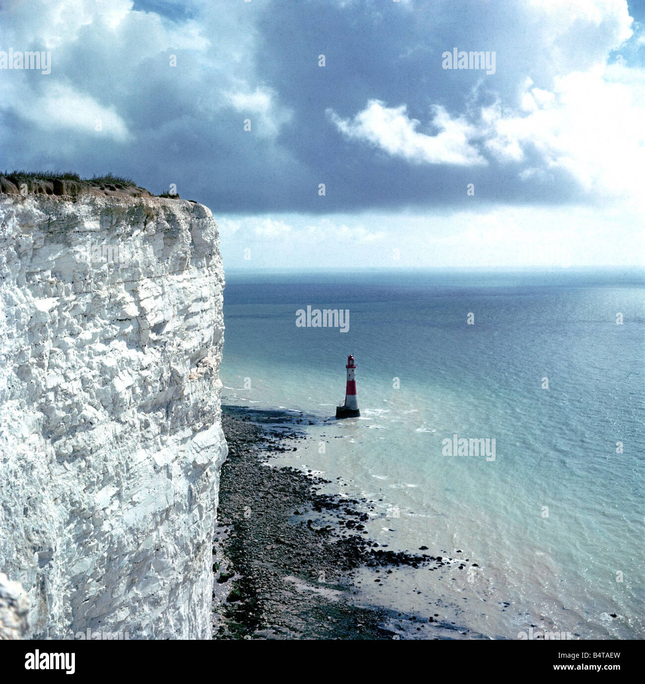 A view of a lighthouse in the sea at Beachy Head English Channel Circa ...