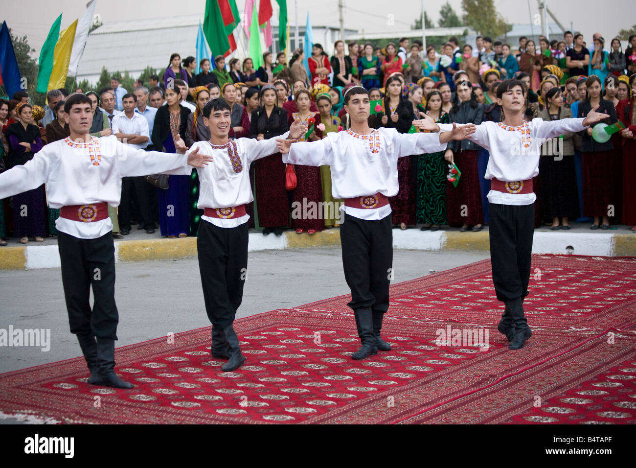 Turkmen dancers performing for delegates at an international conference ...