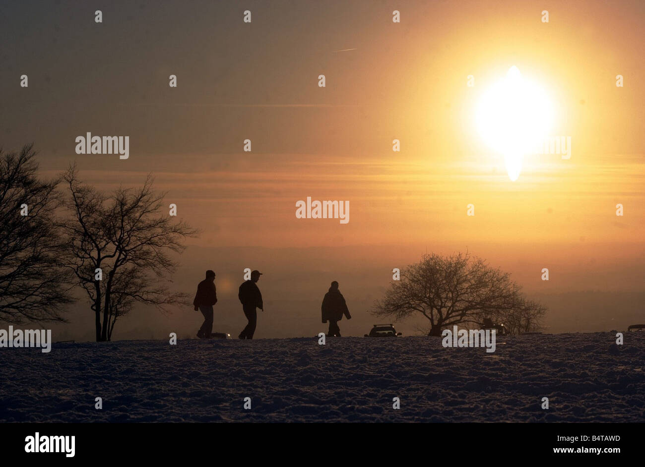 The last sunset of 2001 settles on the Lickey Hills near Bromsgrove ...