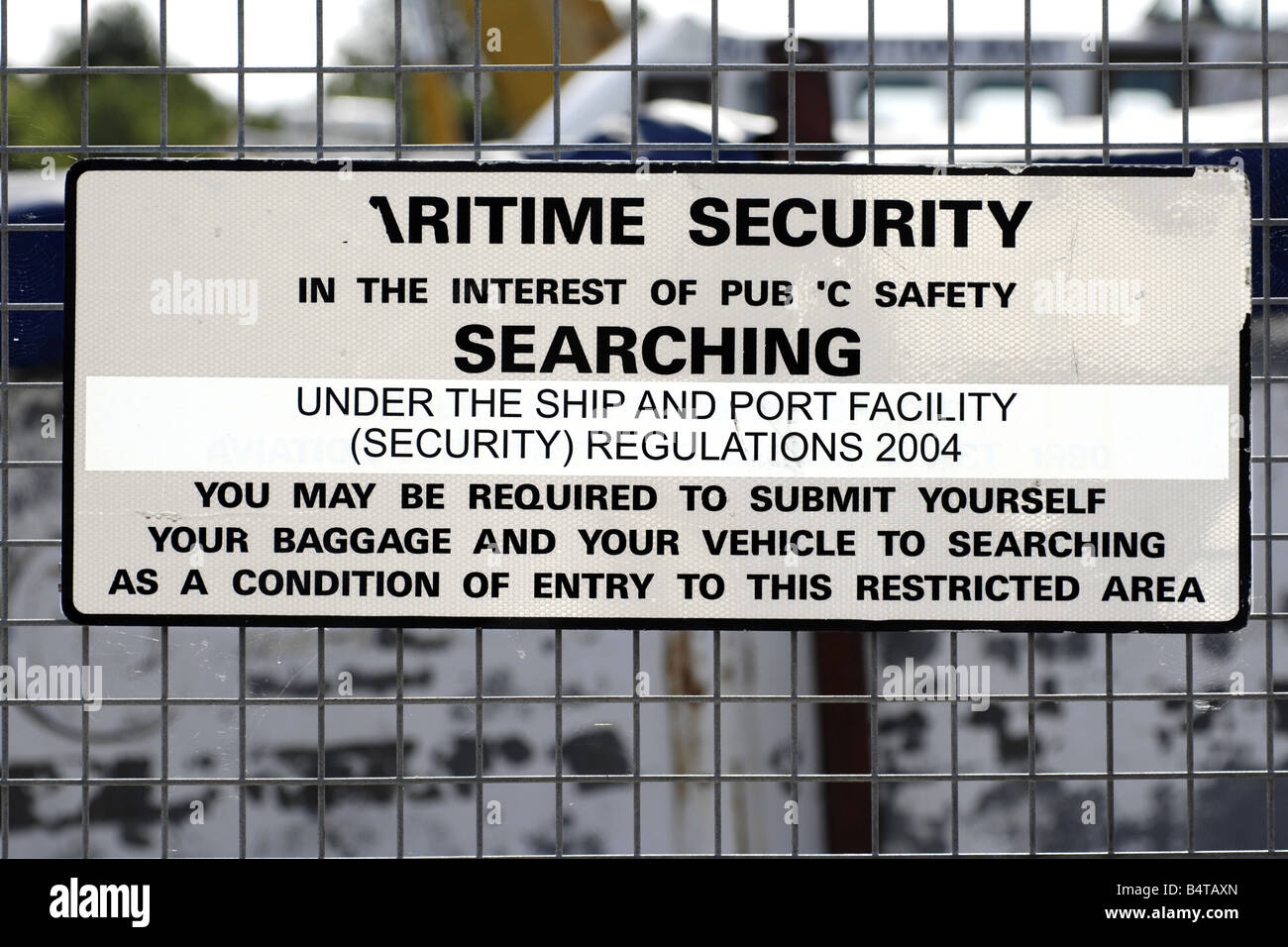 Maritime Security Warning sign attached to a fence Stock Photo - Alamy