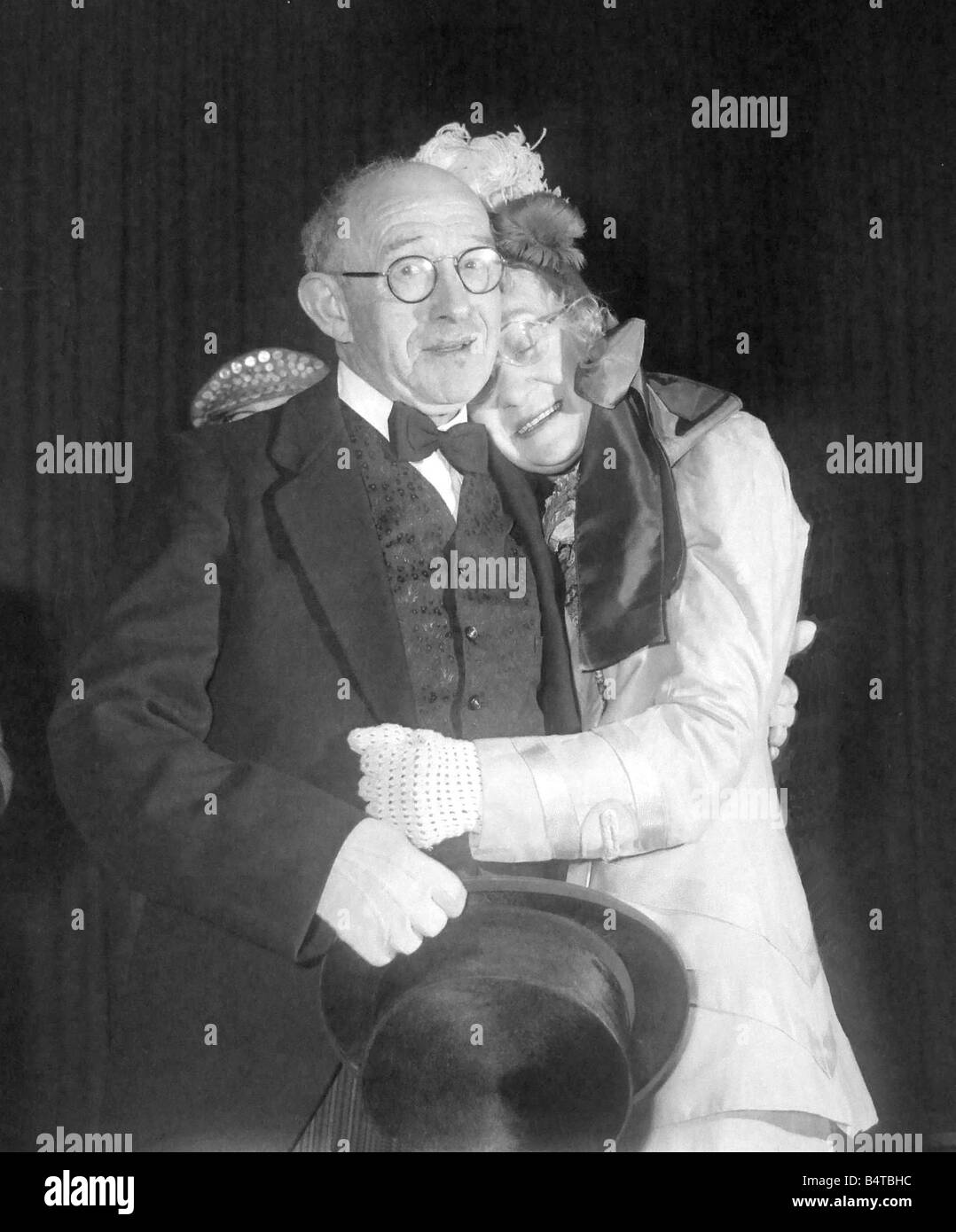 Old couple hug during a concert performance Stock Photo - Alamy
