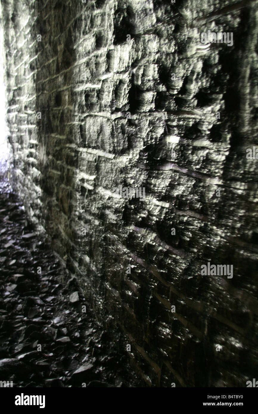 detail of dark damp wet stone wall in alley way Stock Photo - Alamy