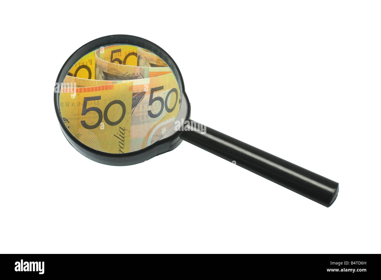 Magnifying Glass with Banknotes Stock Photo - Alamy