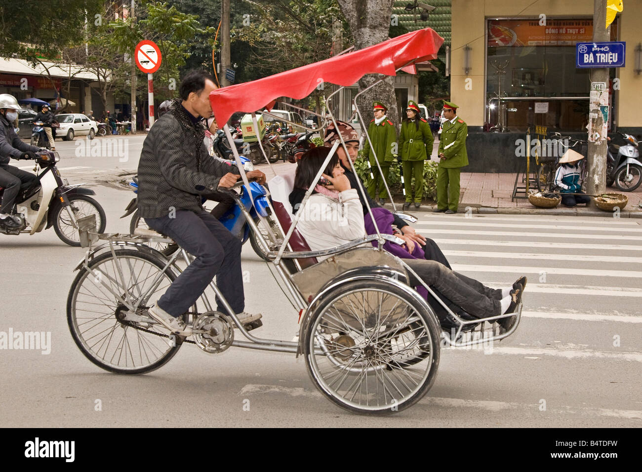 Hanoi cyclo taxi hi-res stock photography and images - Alamy
