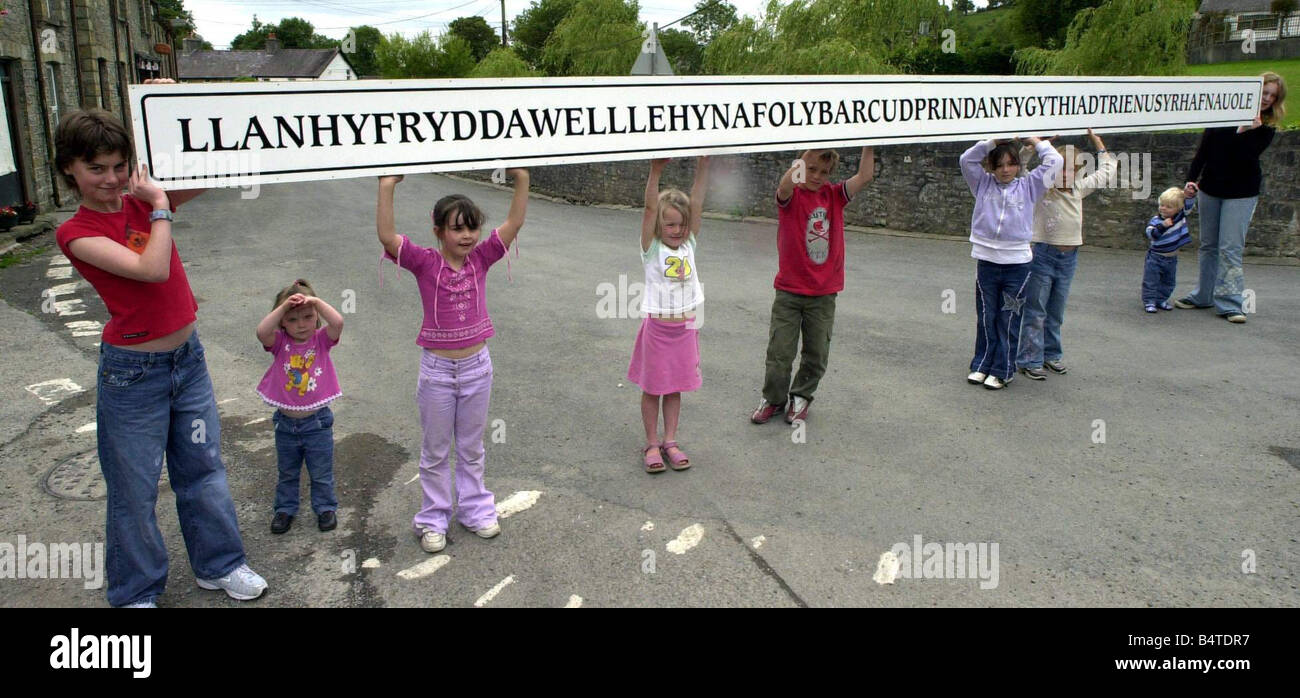 Youngsters from the village of Llanfynydd parade their new village name ...