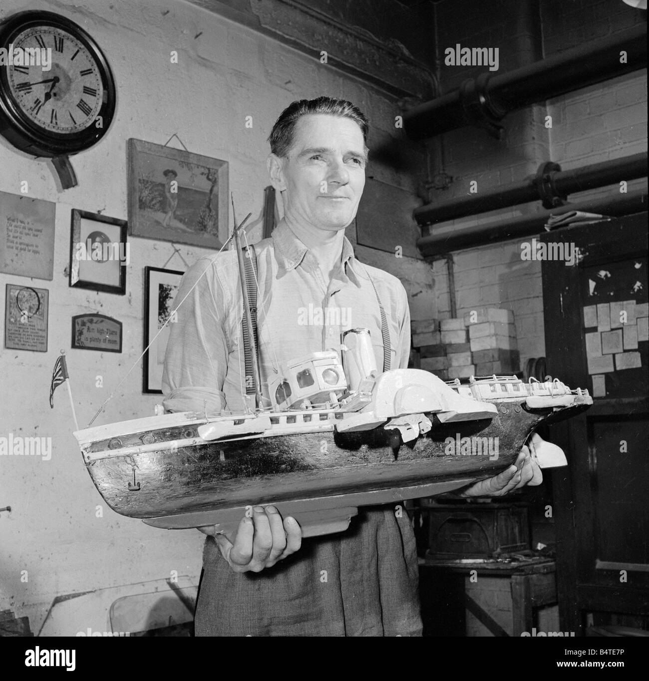 A blind model maker completes his latest model boat Circa 1957 Stock ...