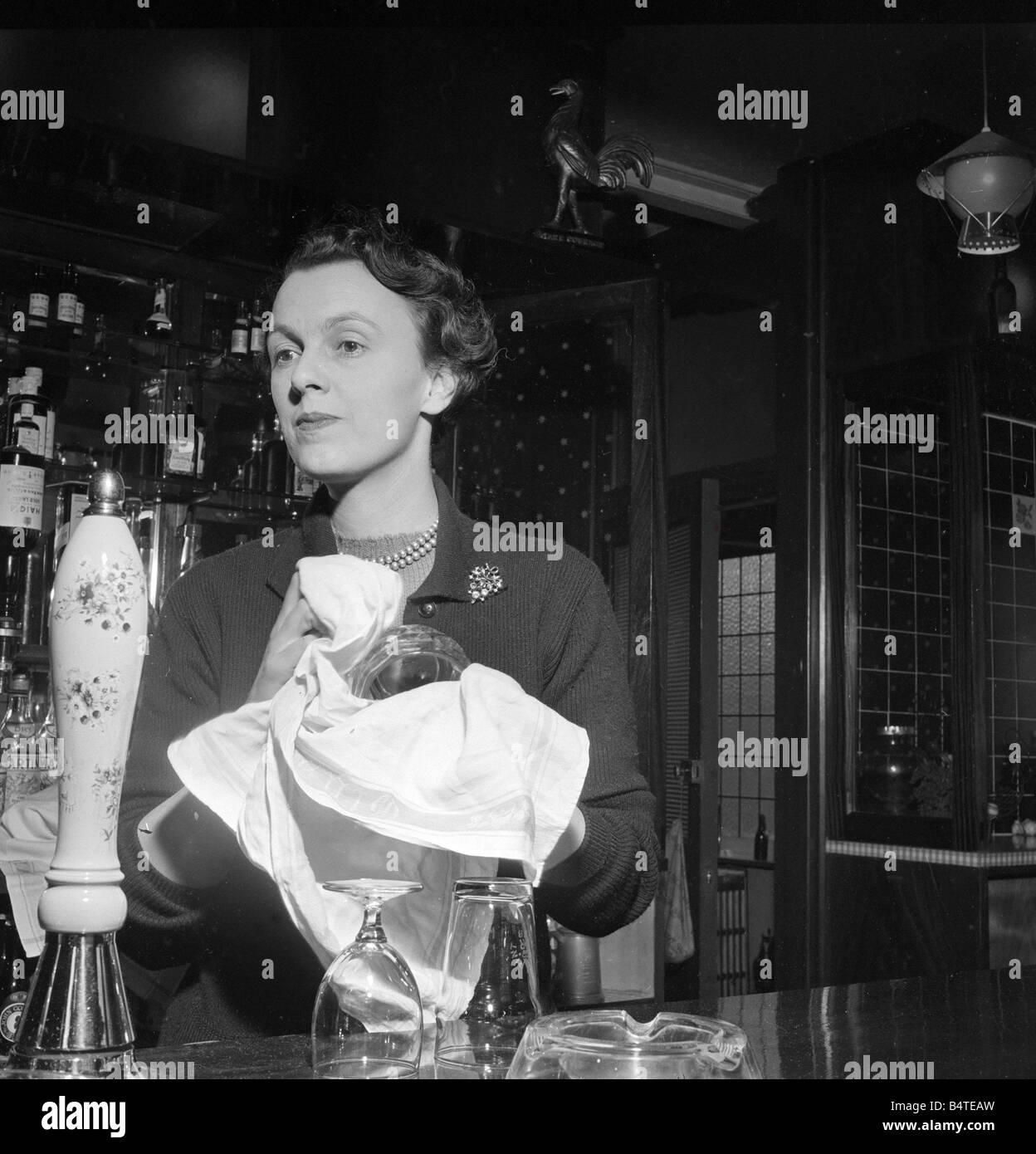 Mrs Hockey seen here working behind the bar of the Princess of Wales ...