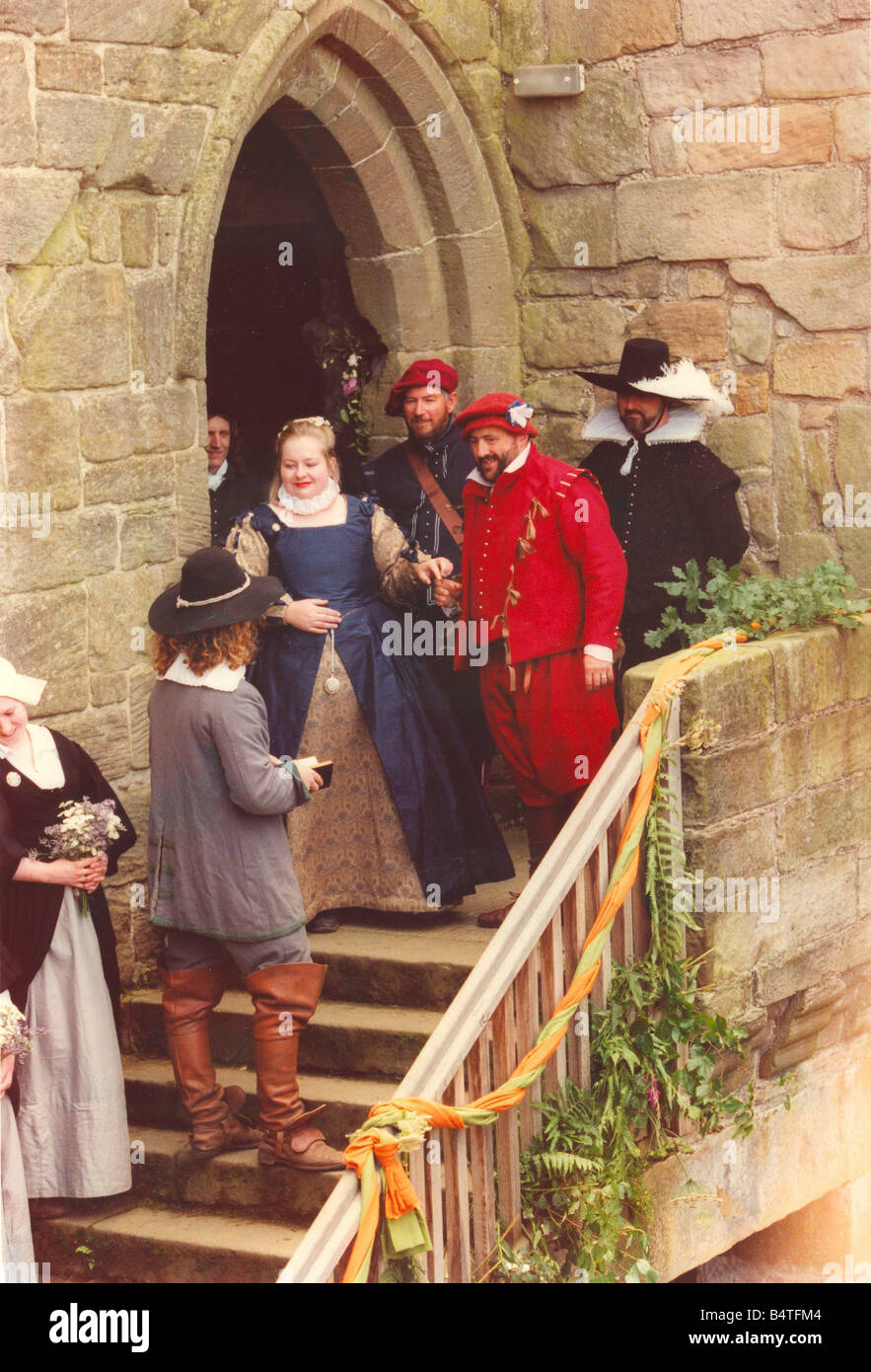 The Tudor theme wedding of Susan Benneworth and Stuart Reid red costume ...