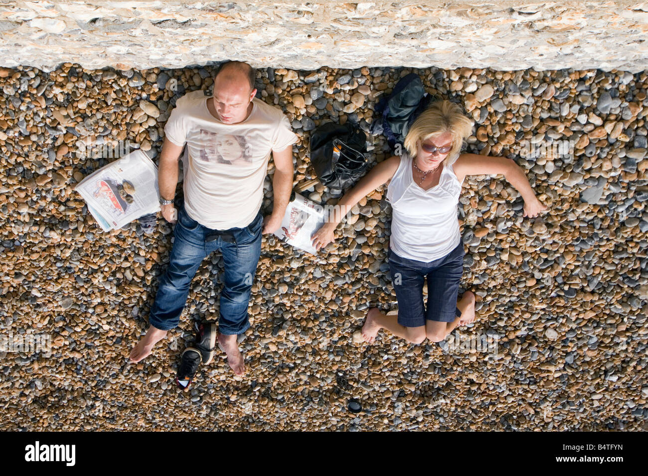 sunbathers on brighton beach, england Stock Photo - Alamy