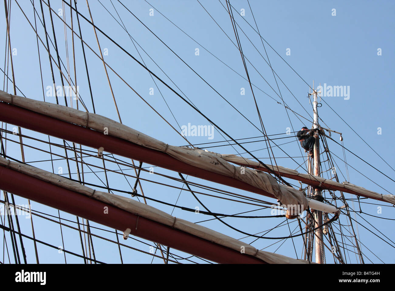 Sailor in the rigging Stock Photo - Alamy
