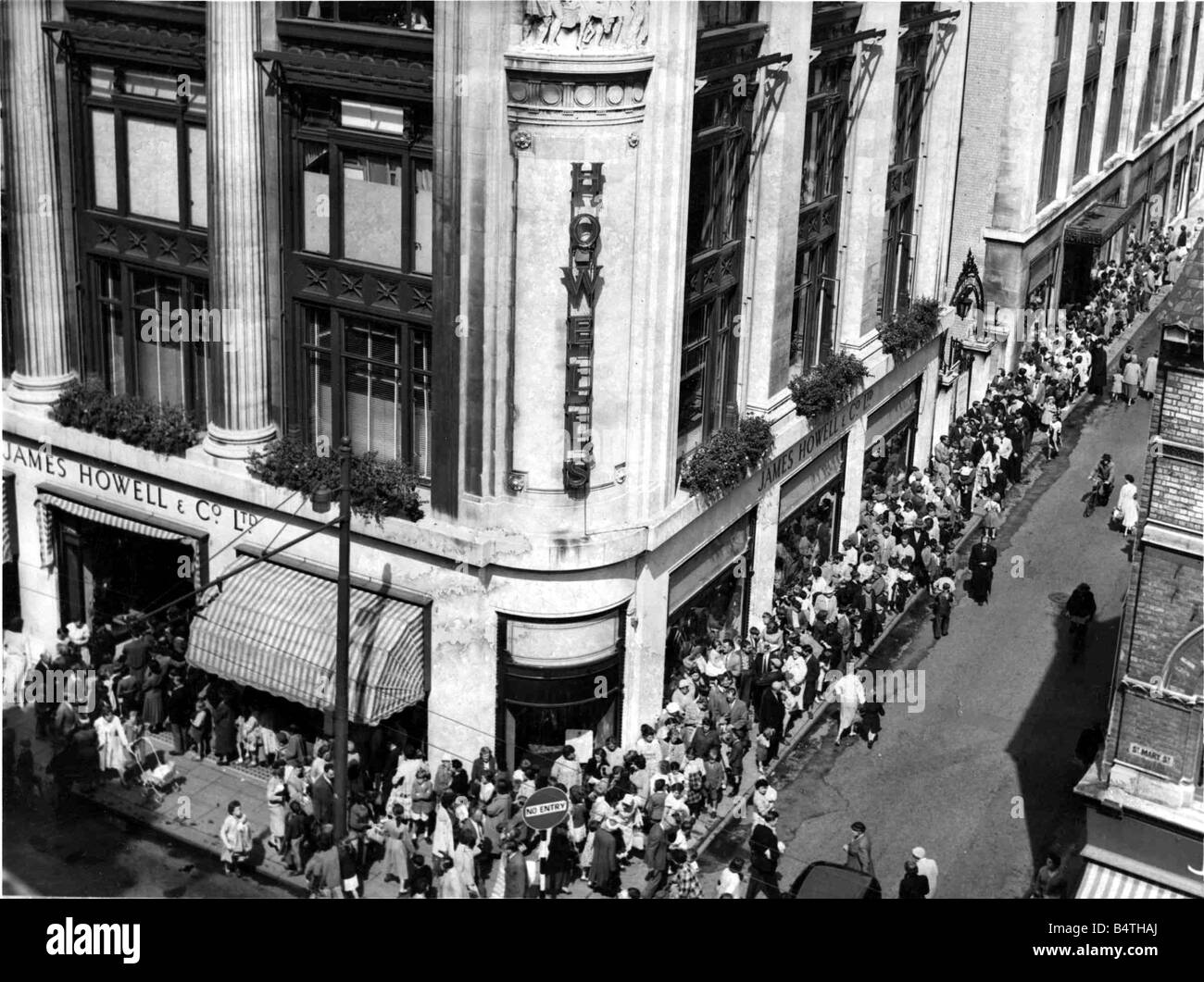 People queue outside Howells department store St Mary Street Cardiff ...