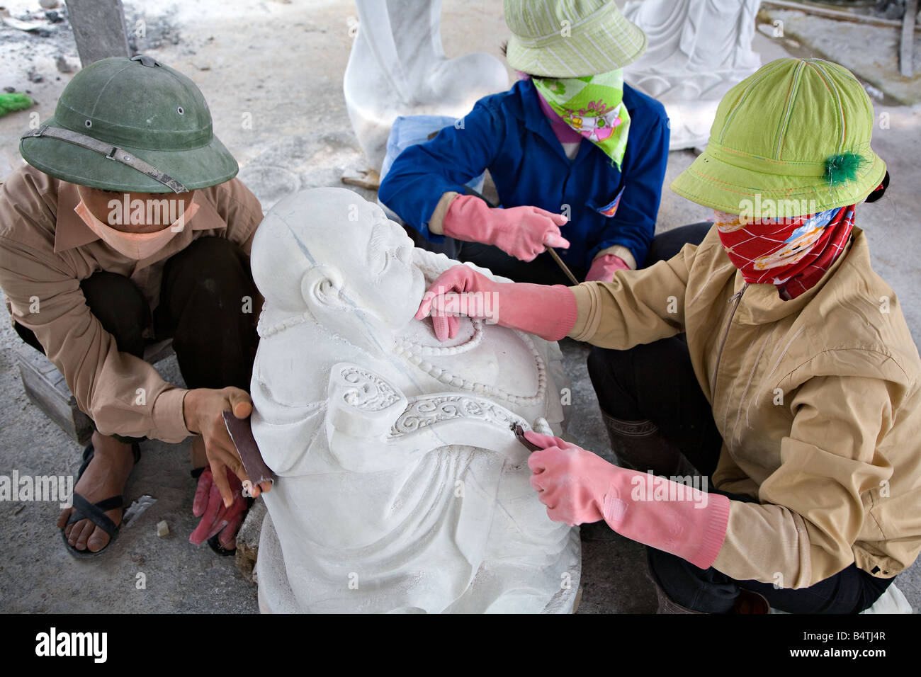 Workers carving and polishing stone at factory Stock Photo - Alamy