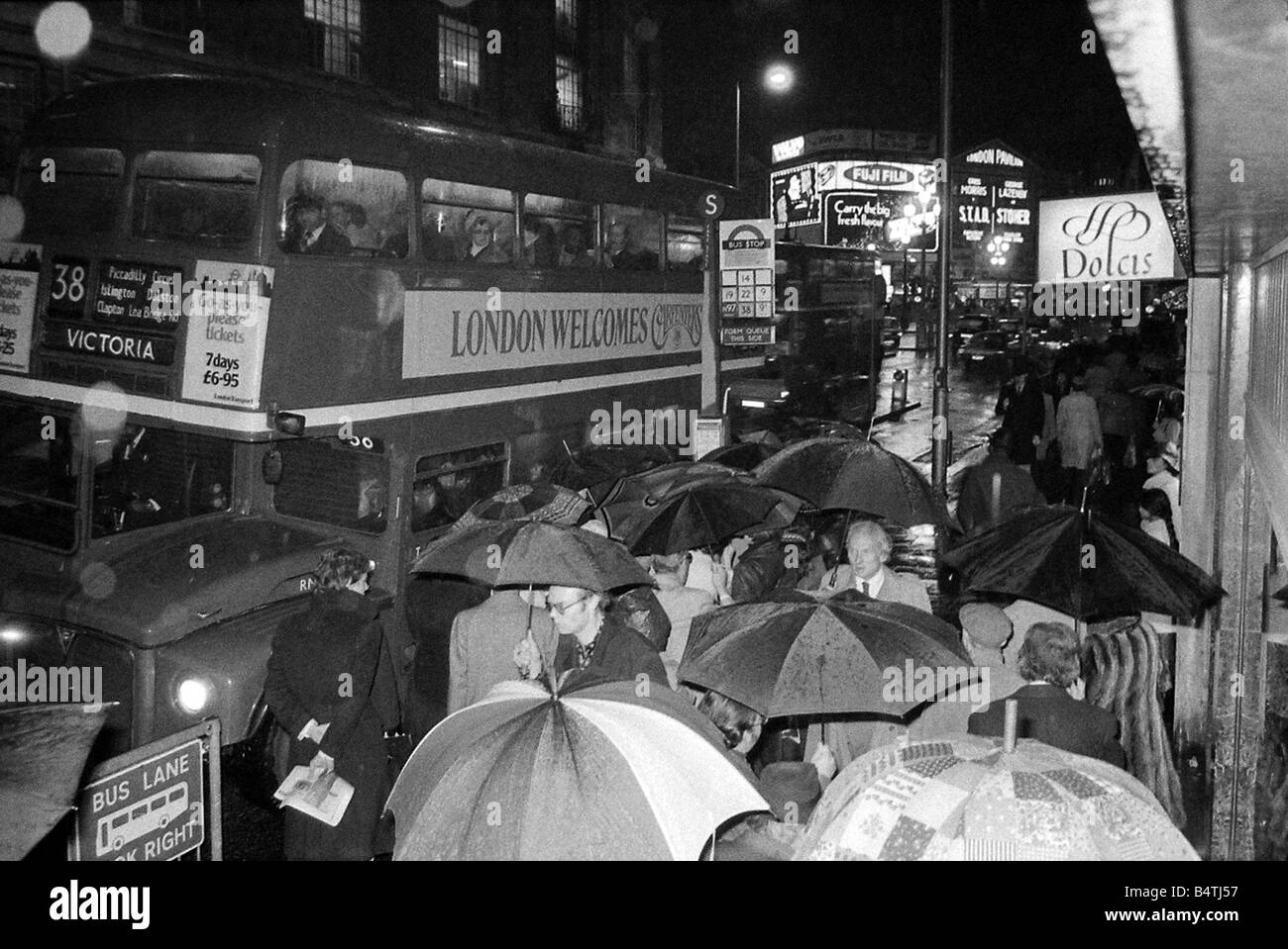 London travellers are soaked by the rain as the end of the 1976 drought ...