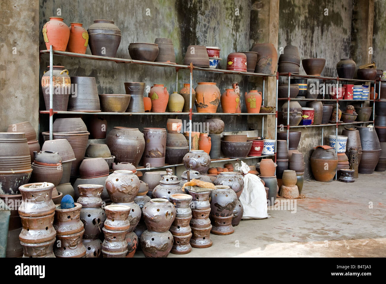 Finished ceramic pottery at factory Stock Photo - Alamy
