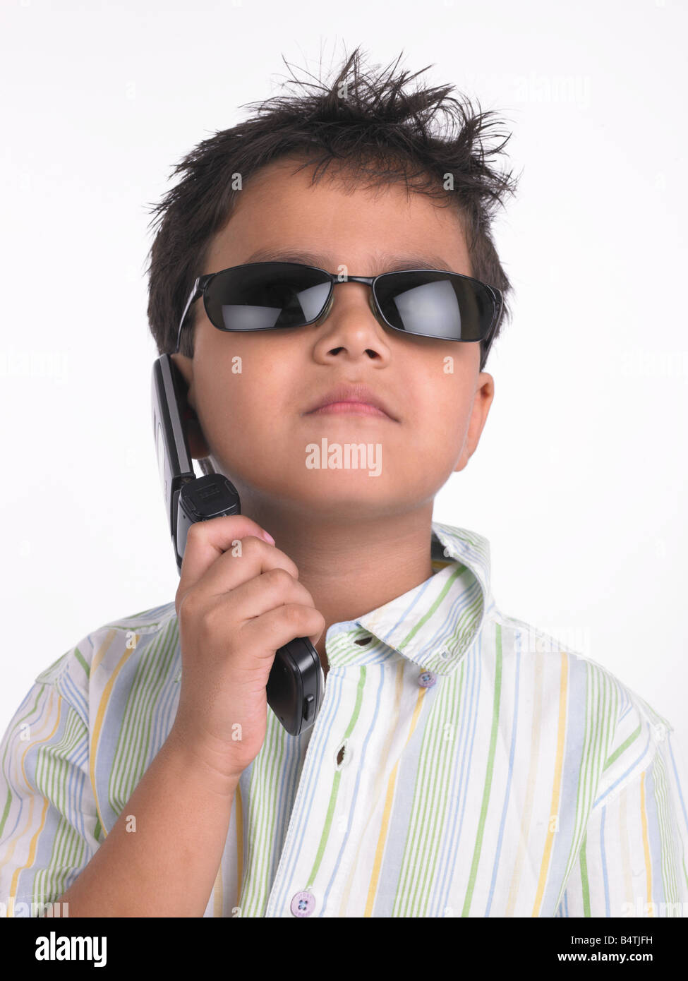 asian child talking iin his cell phone Stock Photo - Alamy