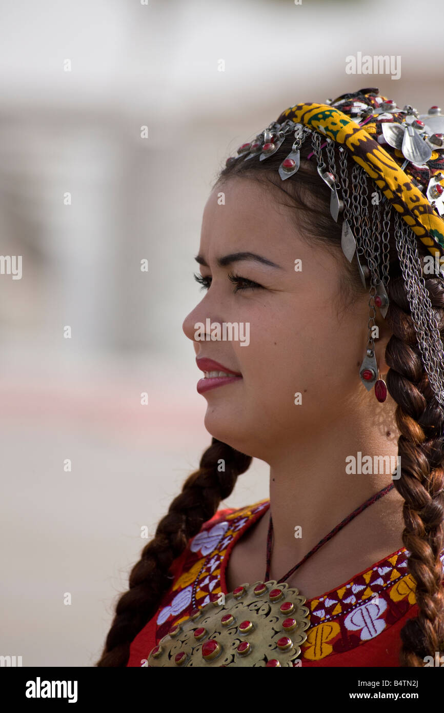 Turkmen girl welcoming delegates of international conference at visit ...