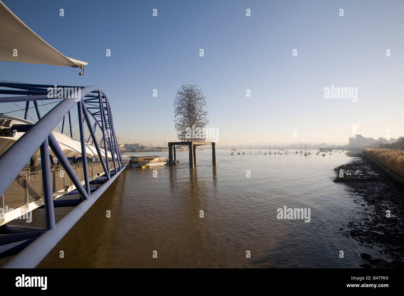 Iron metal modern statue sculpture structure on the Thames at the O2 ...