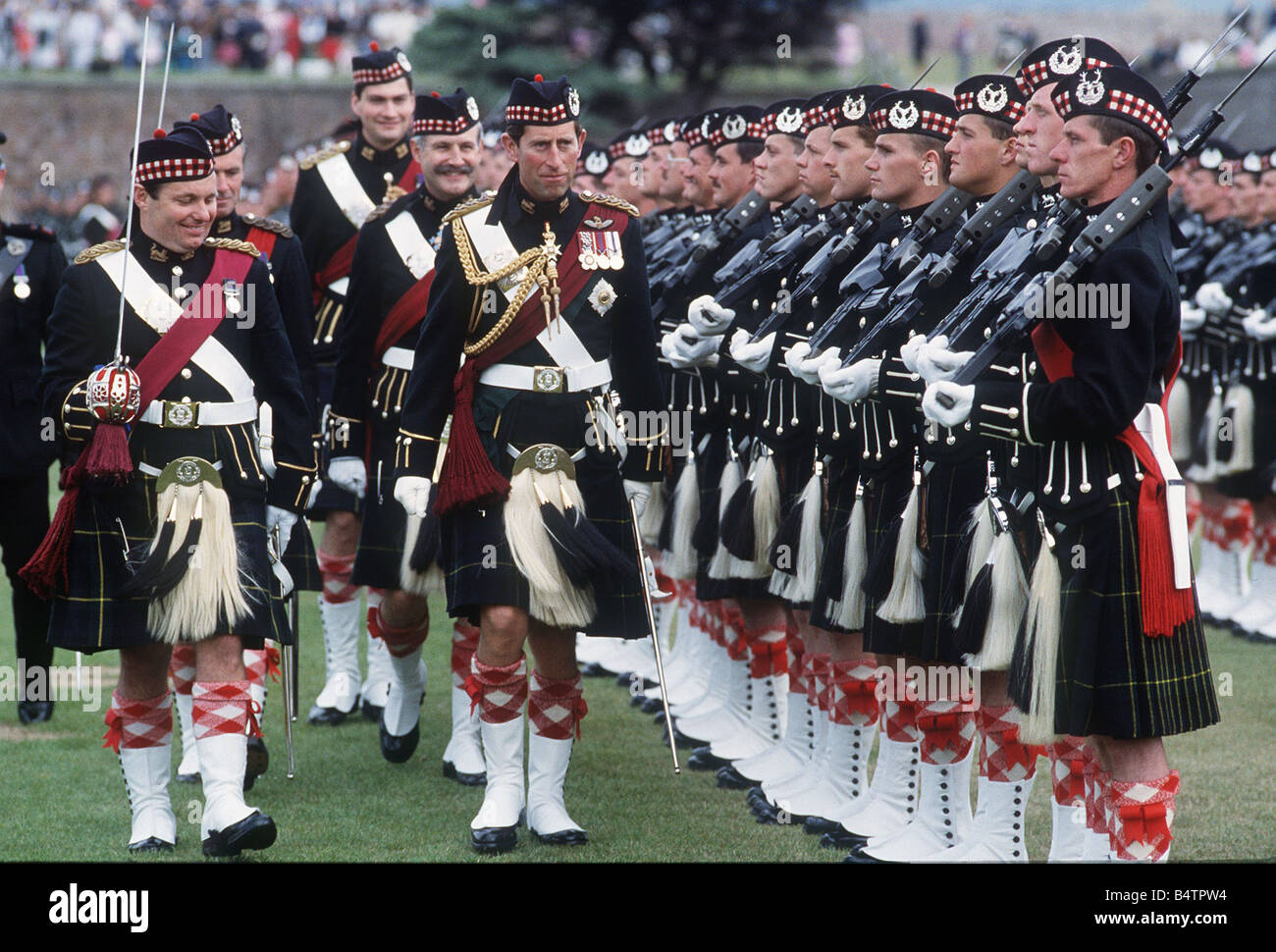 Prince Charles inspecting the ranks in full Scottish military outfit ...