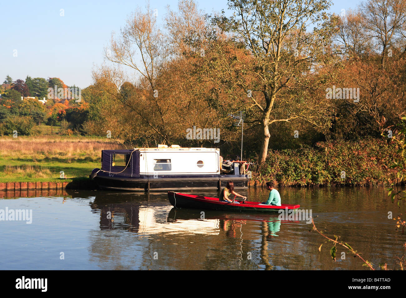 Woman rowing boat on river hi-res stock photography and images - Alamy