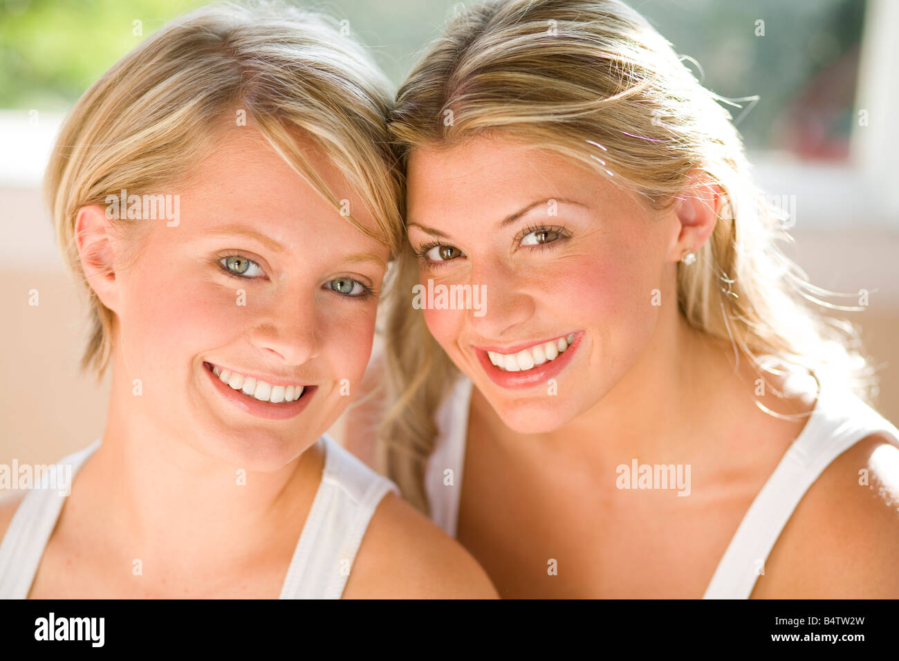 Portrait of two attractive girls Stock Photo - Alamy