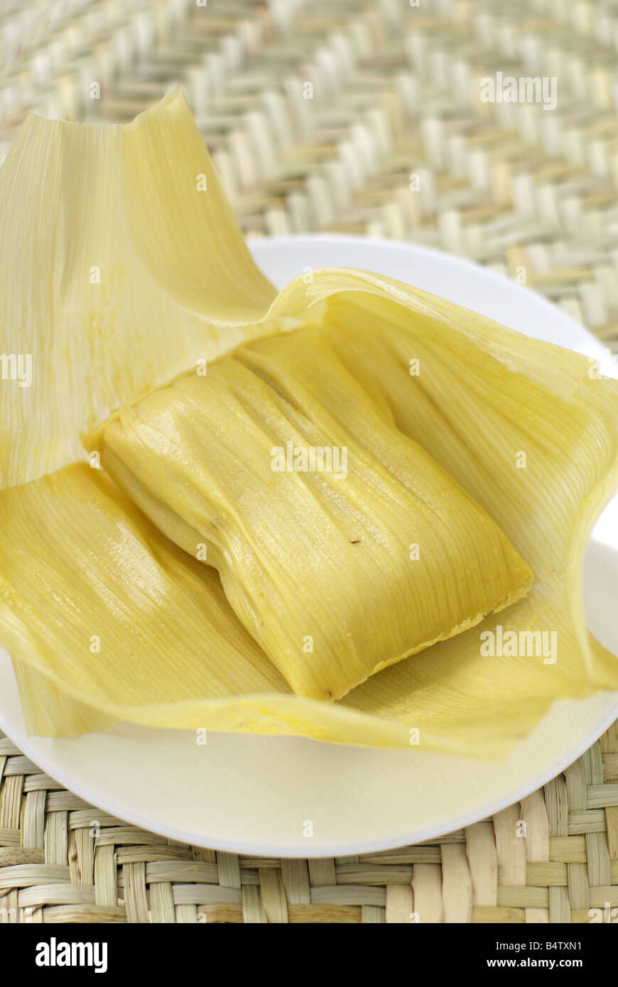 one unwrapped pamonha doce (traditional brazilian food Stock Photo - Alamy