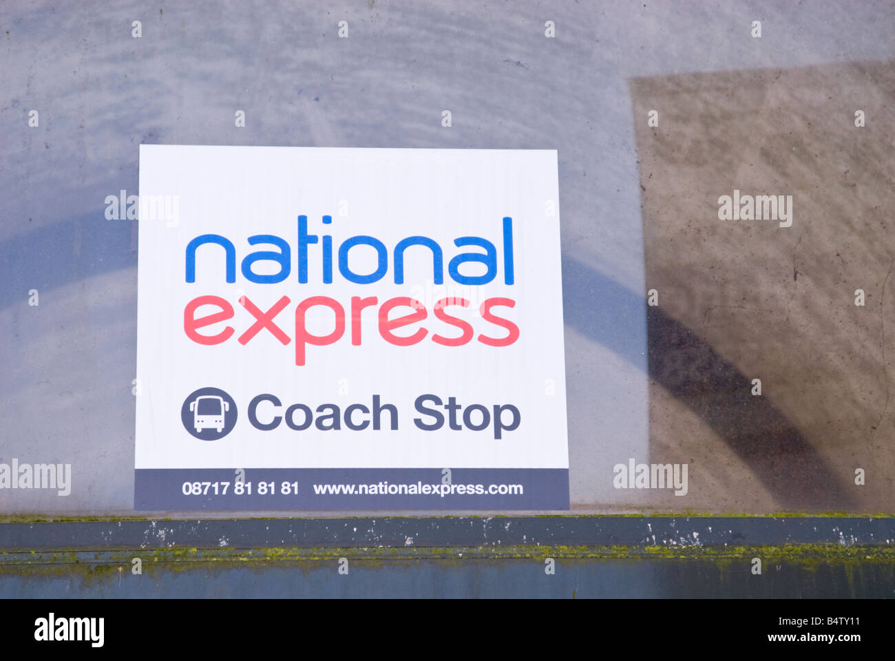 National Express coach stop sign at Uk bus stop Stock Photo - Alamy