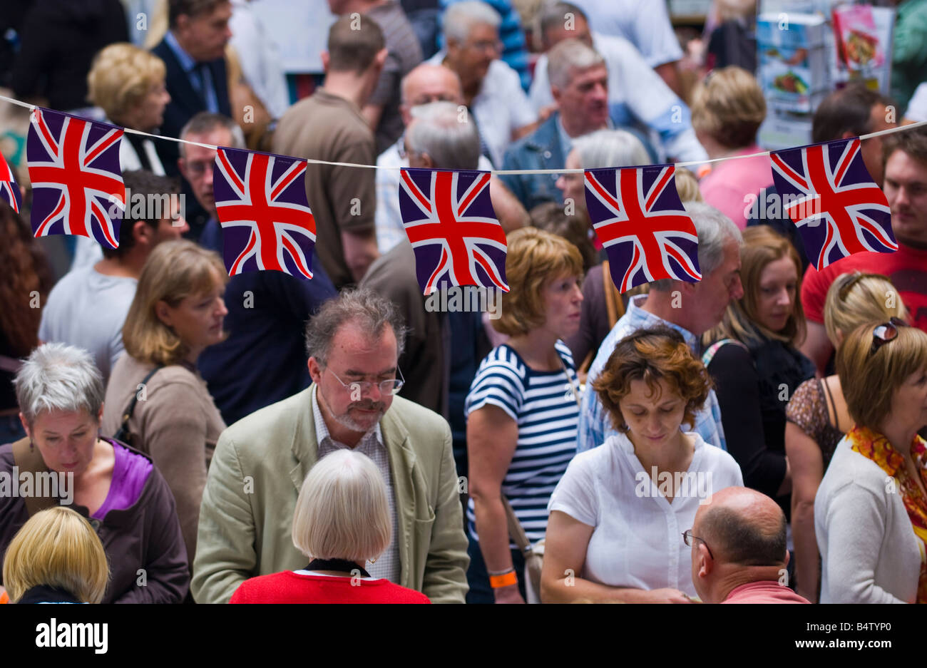 Union Jack bunting Union Jack flags with crowd of people browsing ...