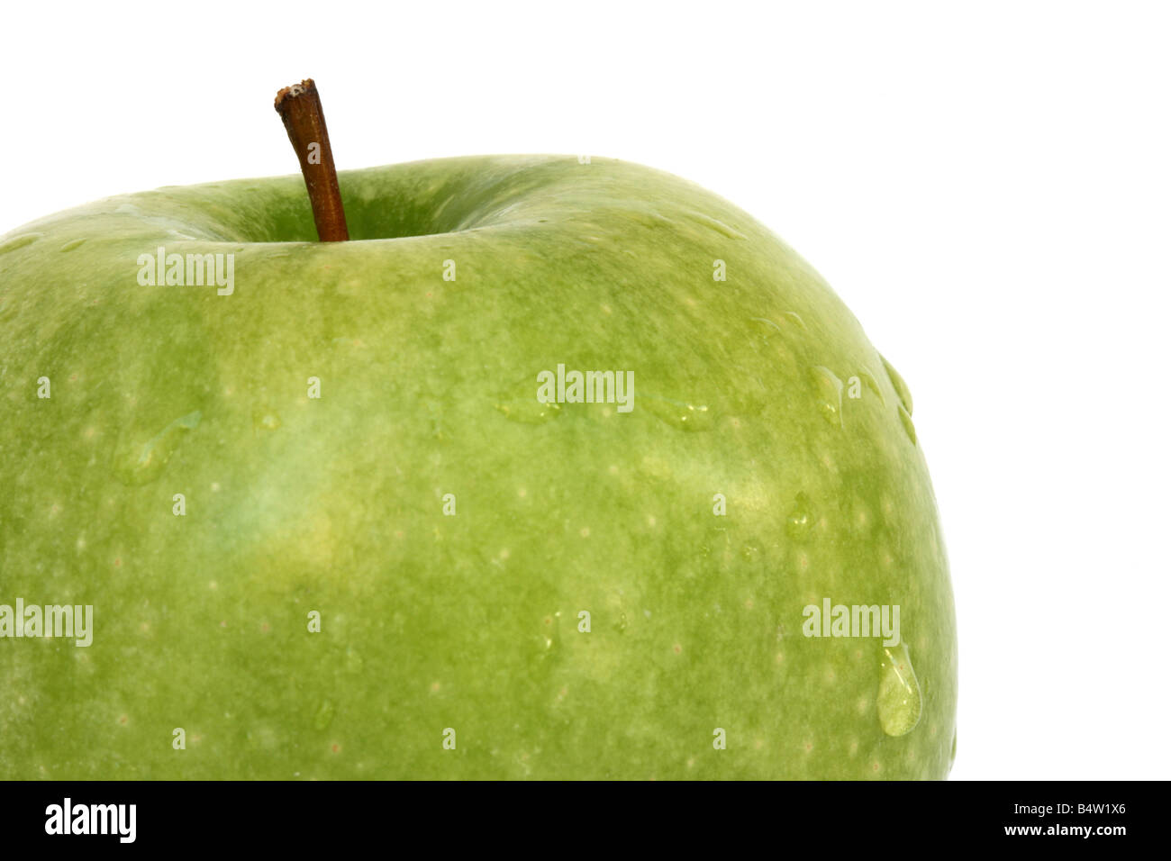 wet green apple detail isolated on white background Stock Photo - Alamy