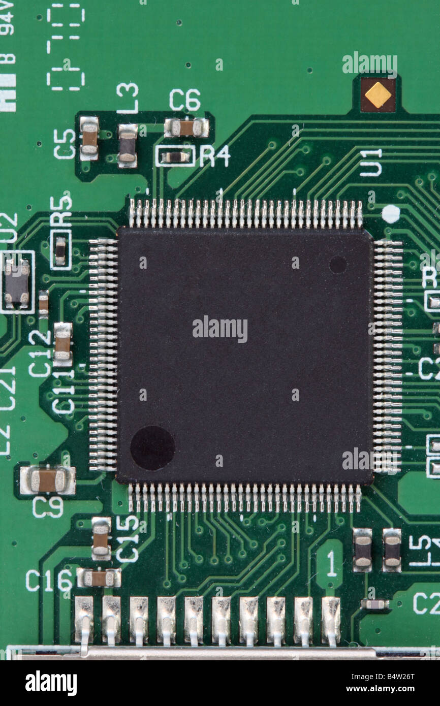 black processor on green circuit board detail with copyspace Stock ...