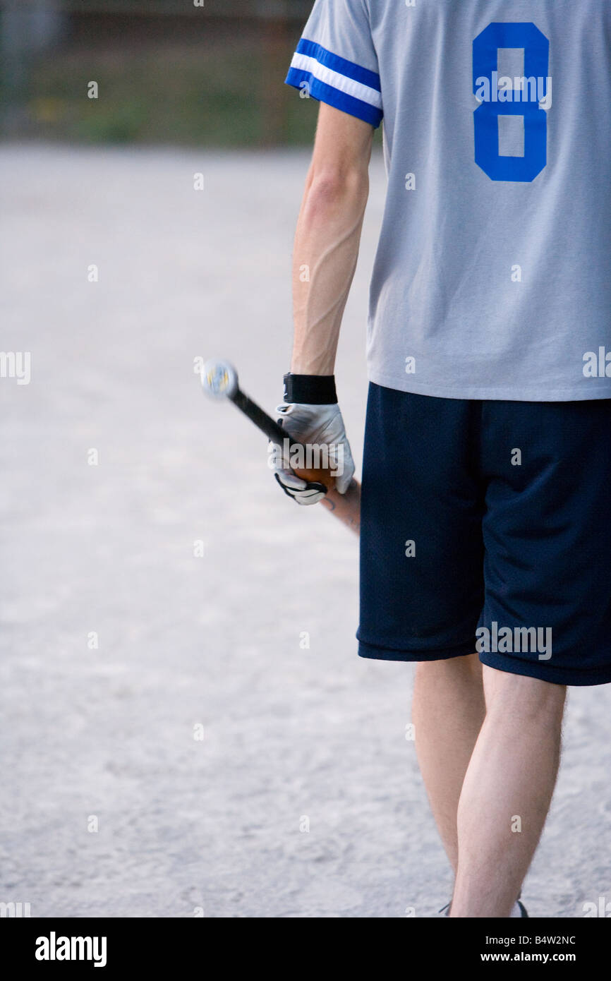 Man baseball bat behind back hi-res stock photography and images - Alamy