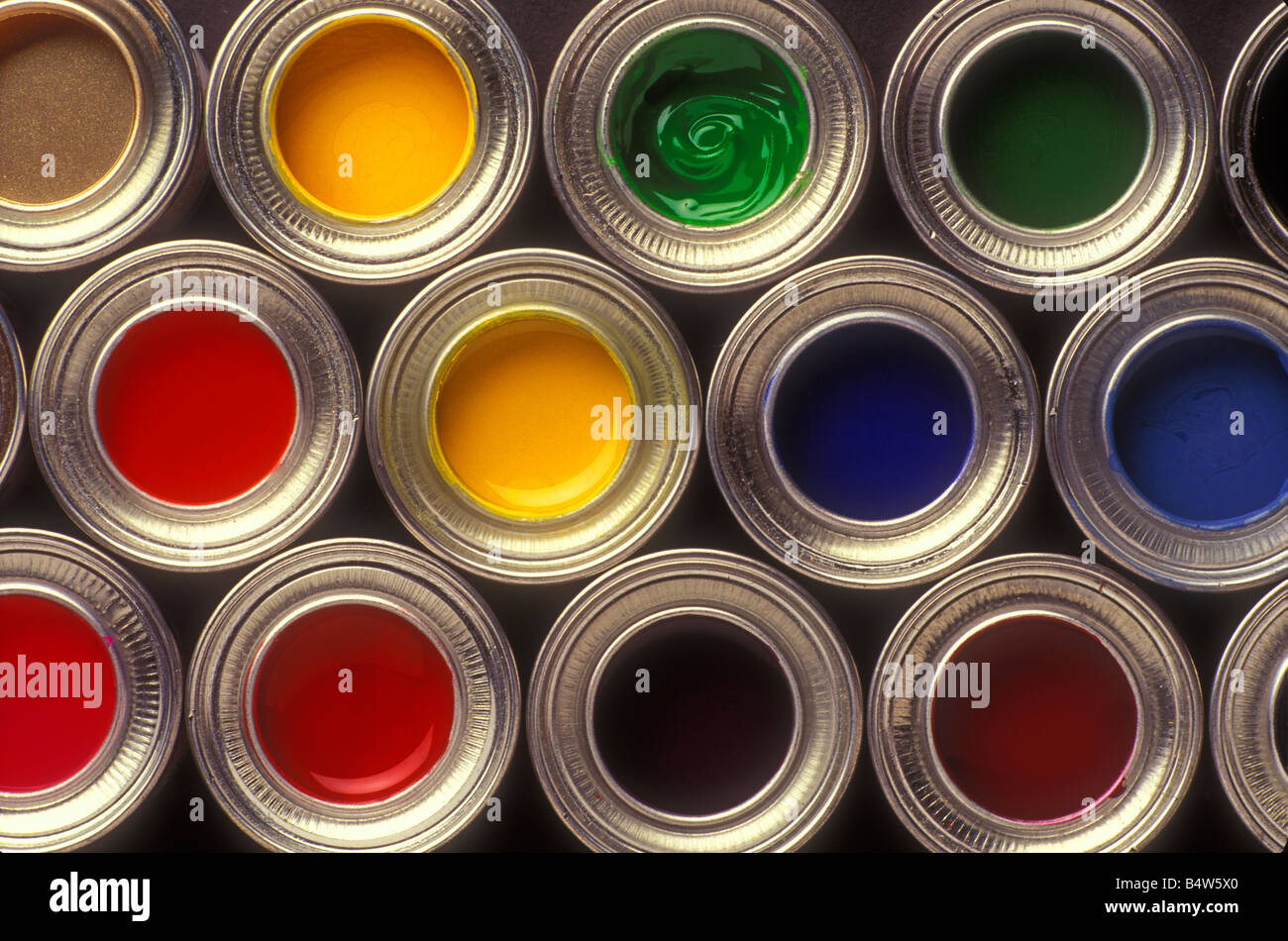 multi colored paint cans Stock Photo - Alamy