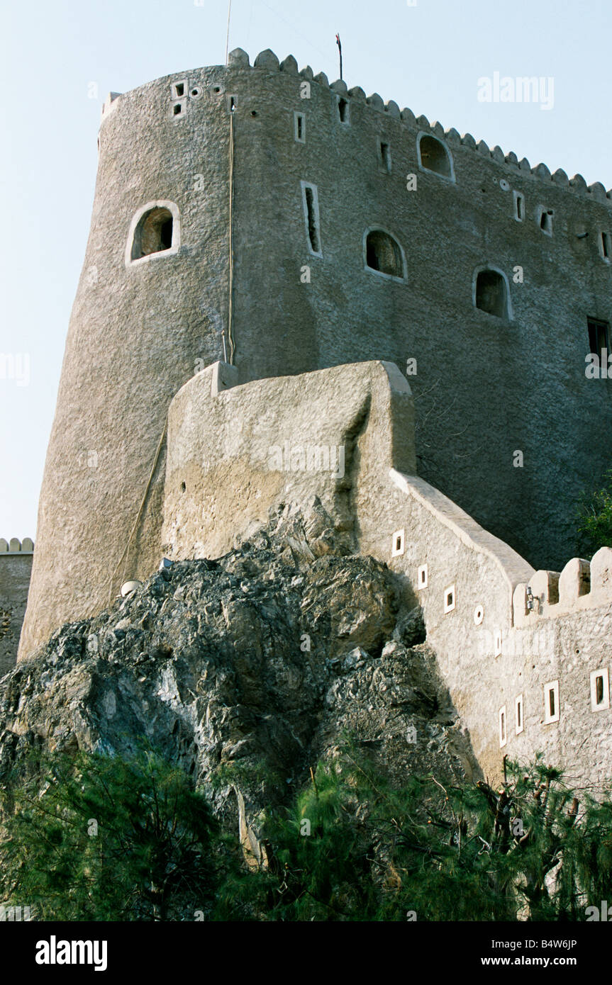 Oman, Muscat, Old Muscat. The ramparts of Fort Mirani loom over the ...