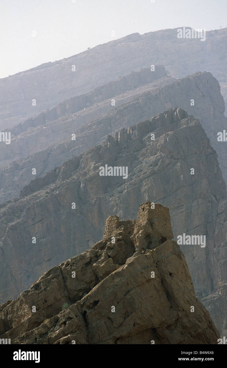 Oman, Jabal al Akhdar, Wadi Bani Auf. An abandoned watchtower perched ...