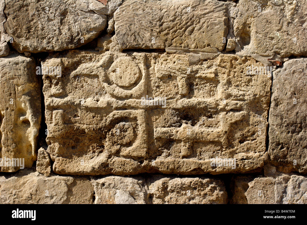 old stone inscription and symbols Stock Photo - Alamy
