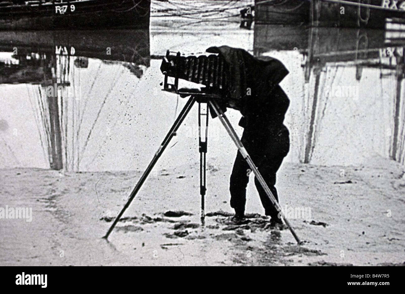 OLD PHOTOGRAPH OF A PHOTOGRAPHER ON THE BEACH MARCH 2001 USING A PLATE ...