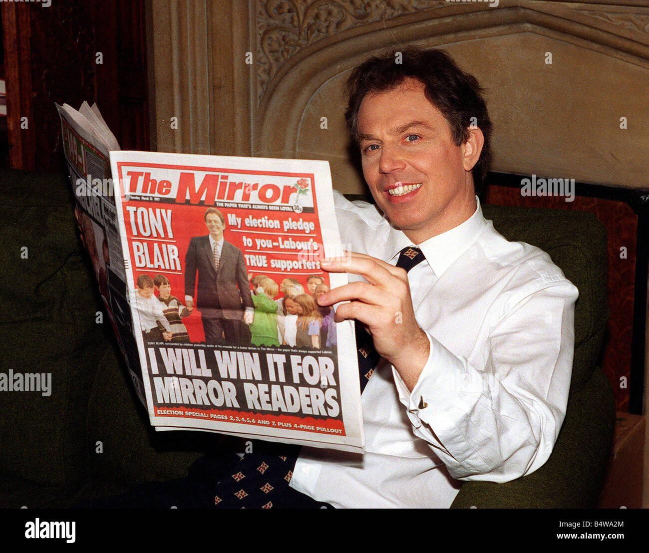 Tony Blair MP Labour Leader reads the Daily Mirror Newspaper at Home ...