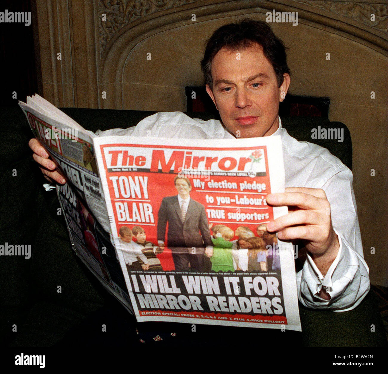 Tony Blair MP Labour Leader reads the Daily Mirror Newspaper at Home ...