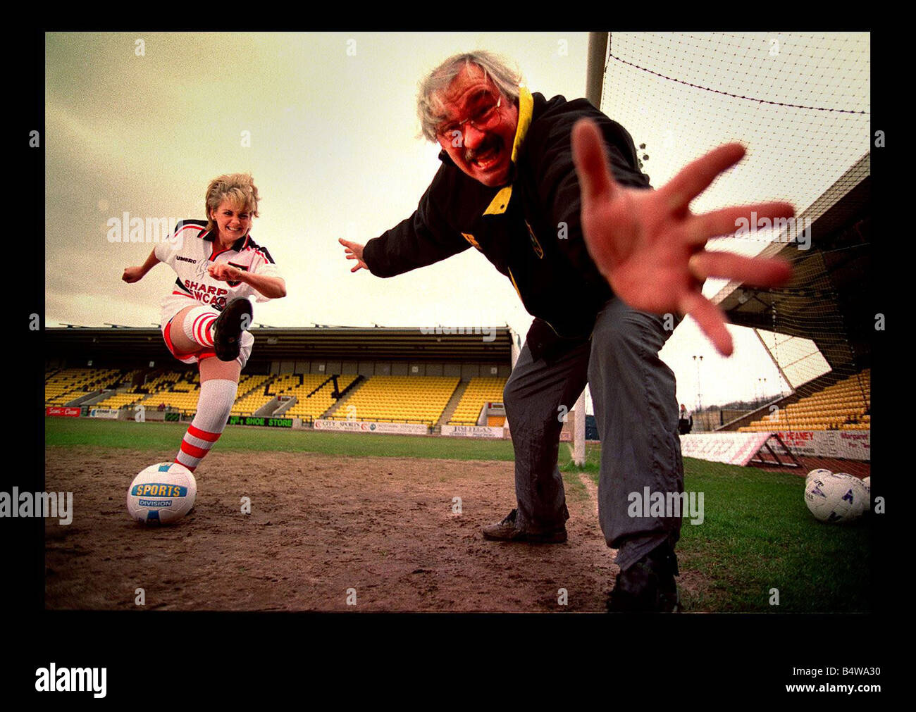Lesley Fitzsimons actress kicks ball past Jim Leishman March 1998 PIC ...