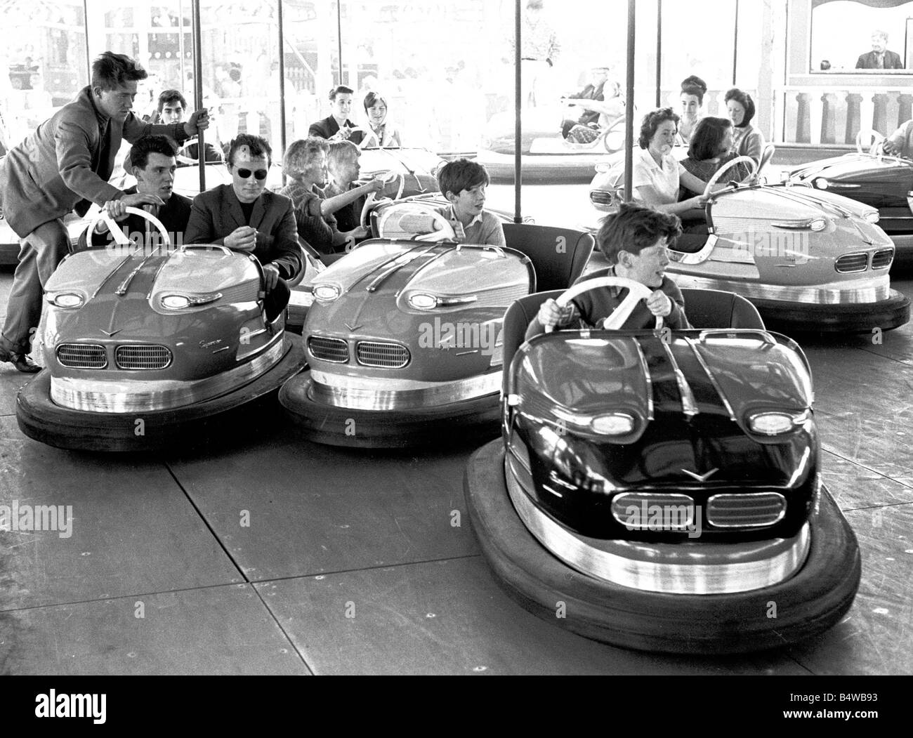 People enjoying the dodgems ride at Hearsall Common fair, Coventry. 3rd ...