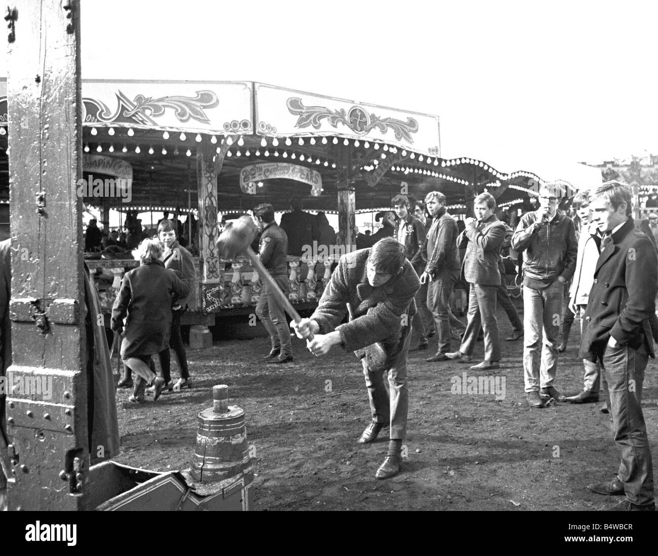 Hearsall Common Easter fair, Coventry. Youths have a go at ringing the ...