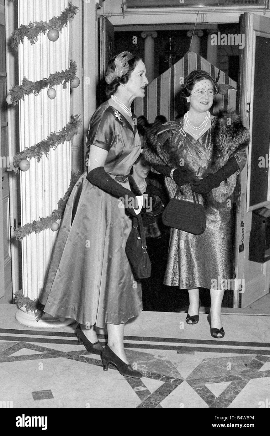 The Queen Mother seen here at the Salon of clothes designer Hardy Amies ...