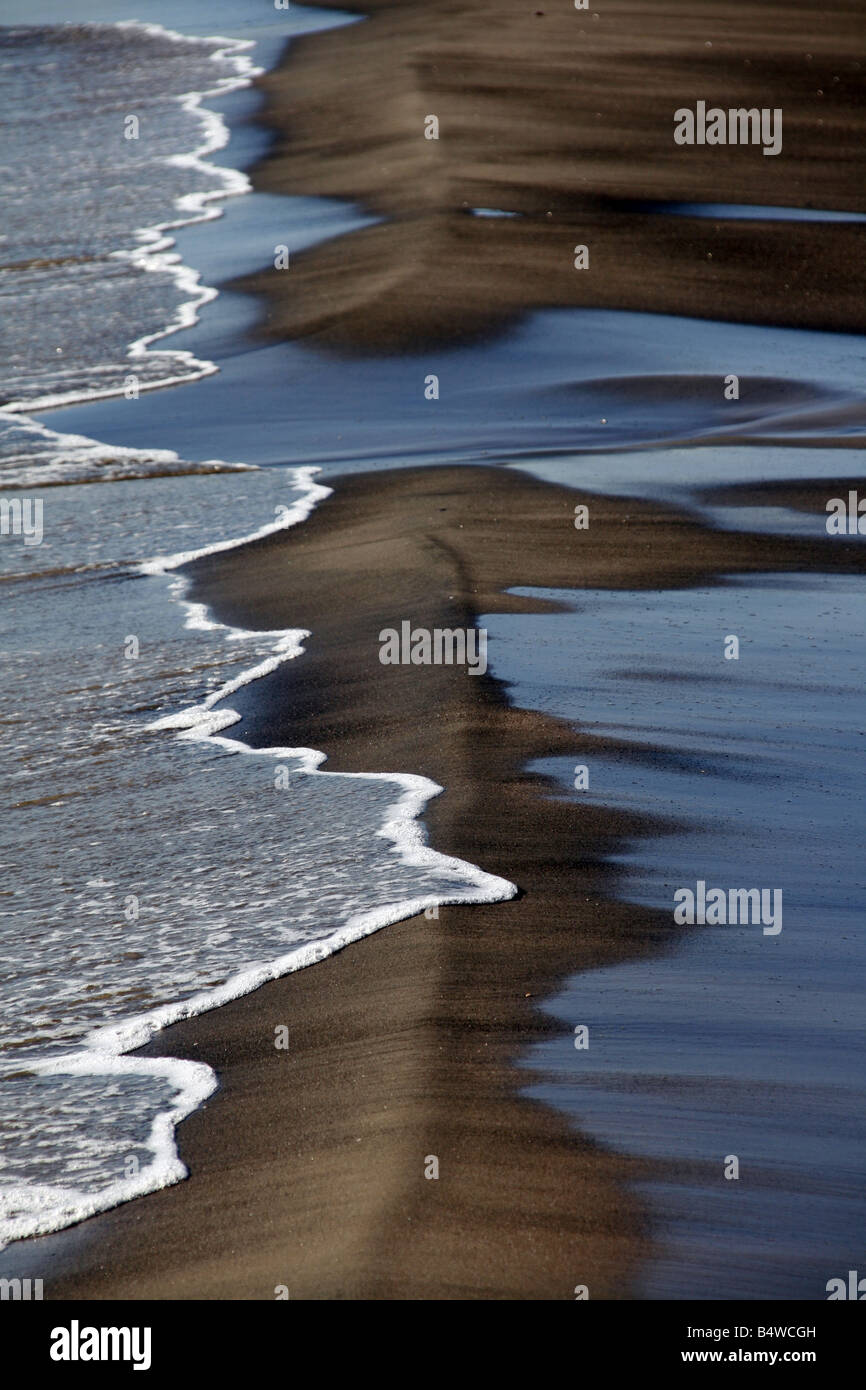 sea wave on sand on beach coast shore Stock Photo - Alamy